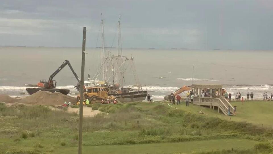 LIVE PICTURE: Crews on scene to free beached shrimp boat Buccaneer ...
