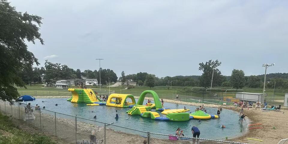 From empty pool to inflatable playground: Blanchardville opens new swim ...