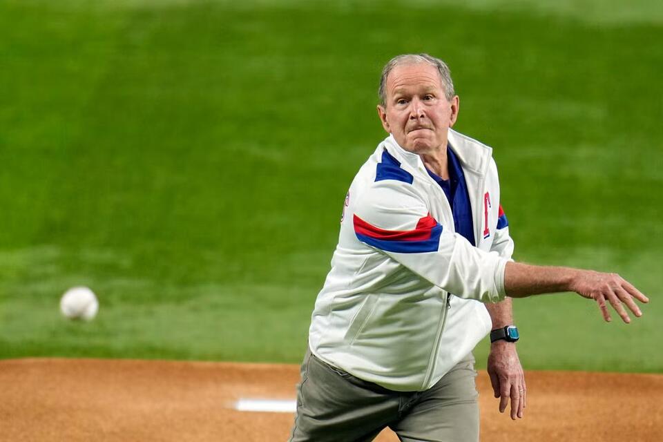 George W. Bush has a little bounce as he throws ceremonial first pitch ...