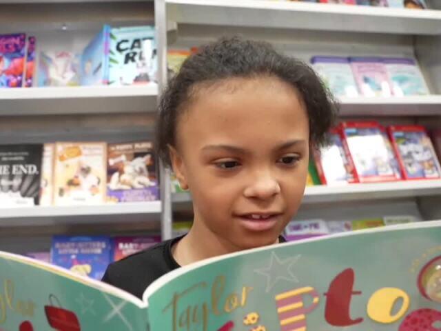 Lansing students get free books through "If You Give a Child a Book ...