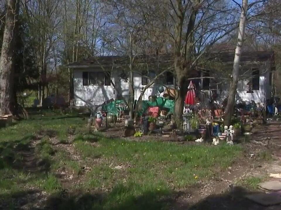 Neighbors confront mounting trash issue as alleged squatters move into ...