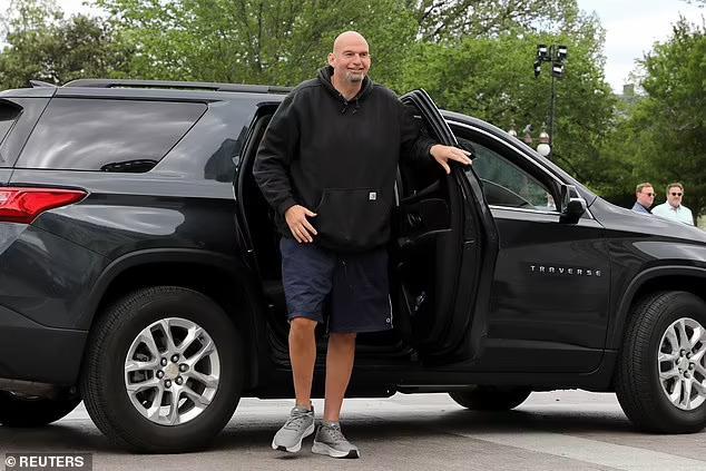 John Fetterman, in hoodie and shorts, returns to Senate, says 'it's ...