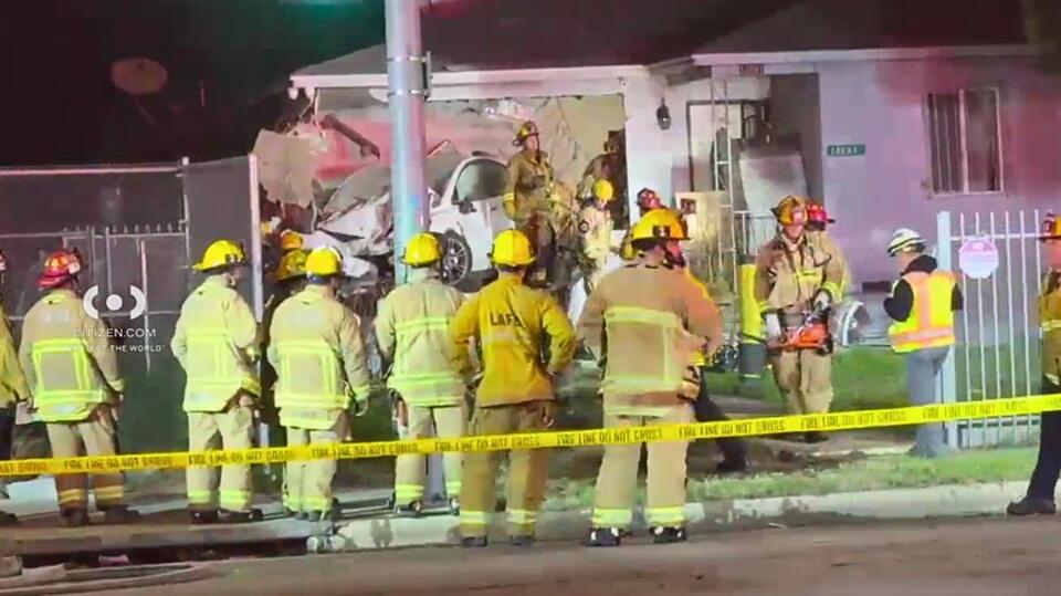 Tesla driver crashes into living room of Pacoima home, injuring 2 ...