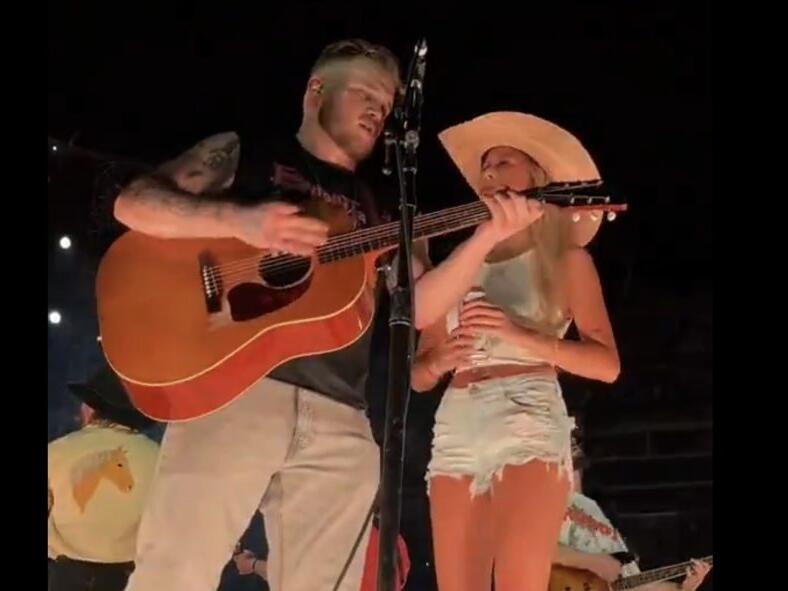 Watch Zach Bryan bring the Hawk Tuah girl on stage in Nashville