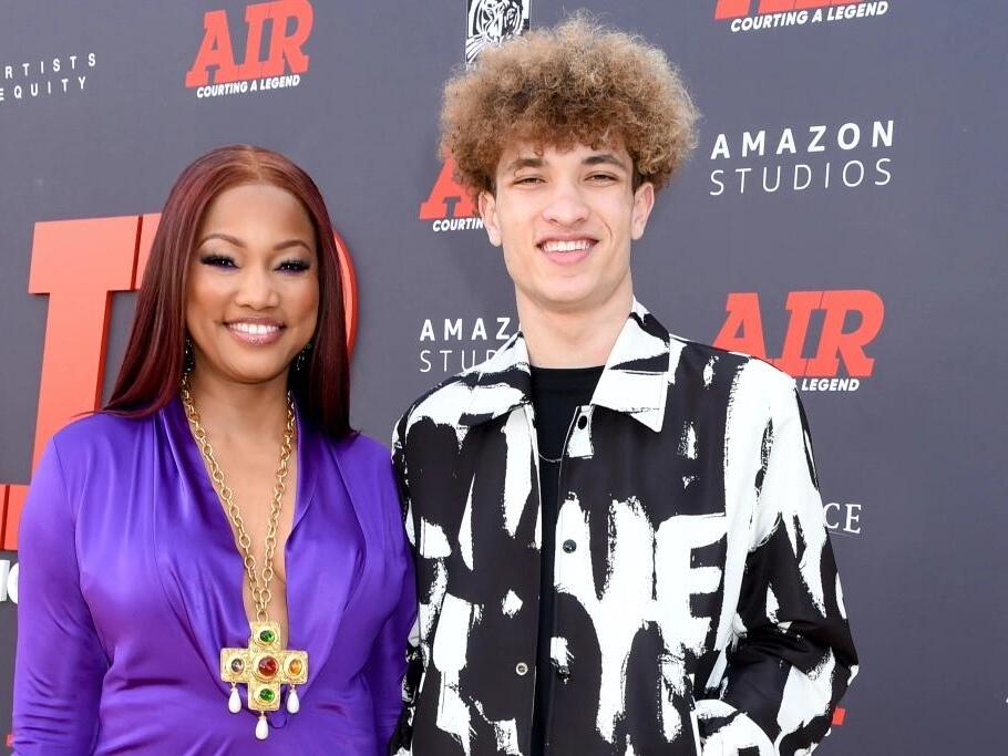 Garcelle Beauvais Goes Regal in Purple Dress & Cutout Pumps With Son ...