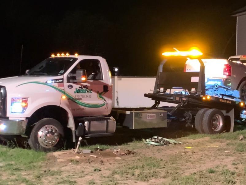Pickup truck crashes into home in Cumberland County, hits new car in garage