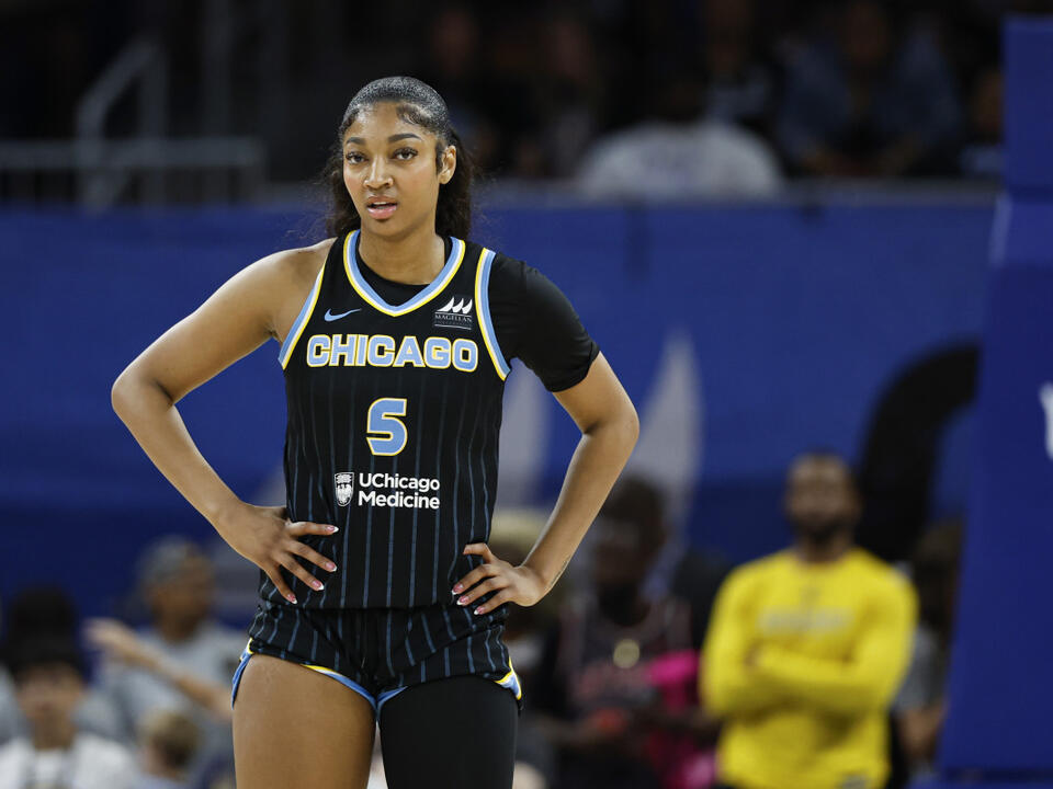 Angel Reese's Courtside Outfit Showcases a Celebrity-Approved Bag