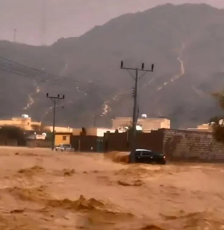 Watch moment cars are swept away & roads become raging rivers as floods swamp Saudi Arabia as ...