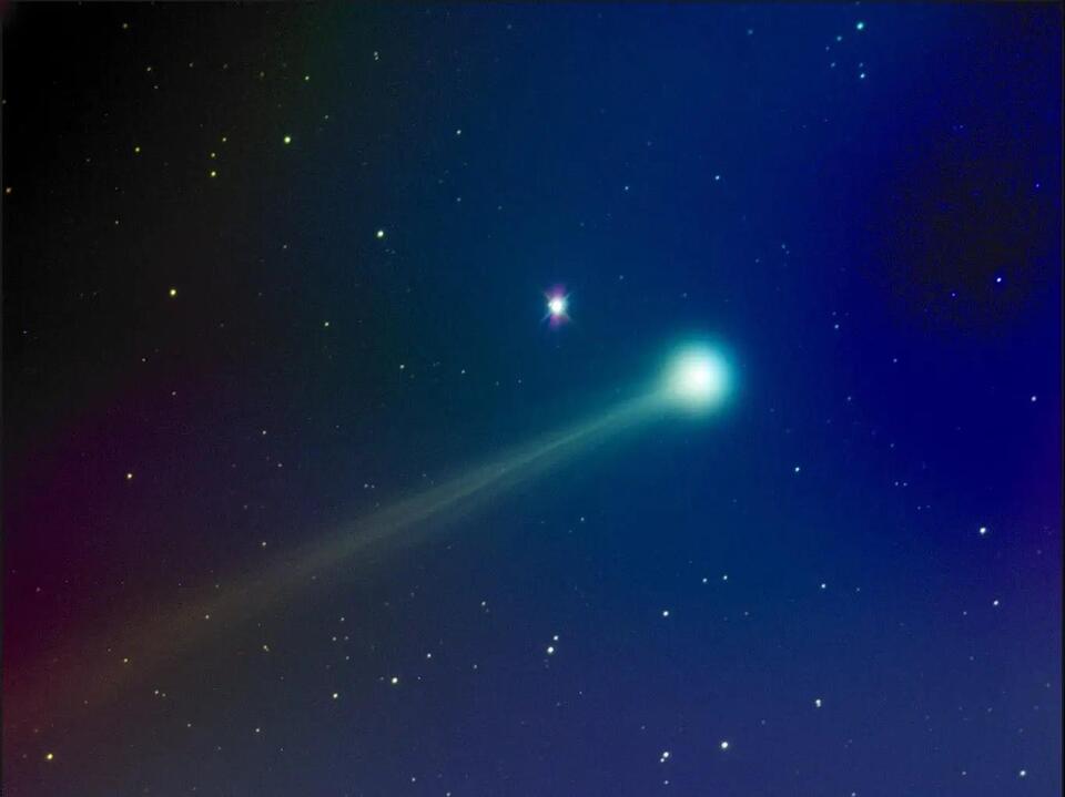 A green comet that takes about 50,000 years to complete its orbit ...