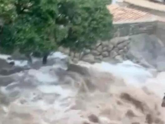 Horror moment terrifying flood surges through Majorca mountain resort ...