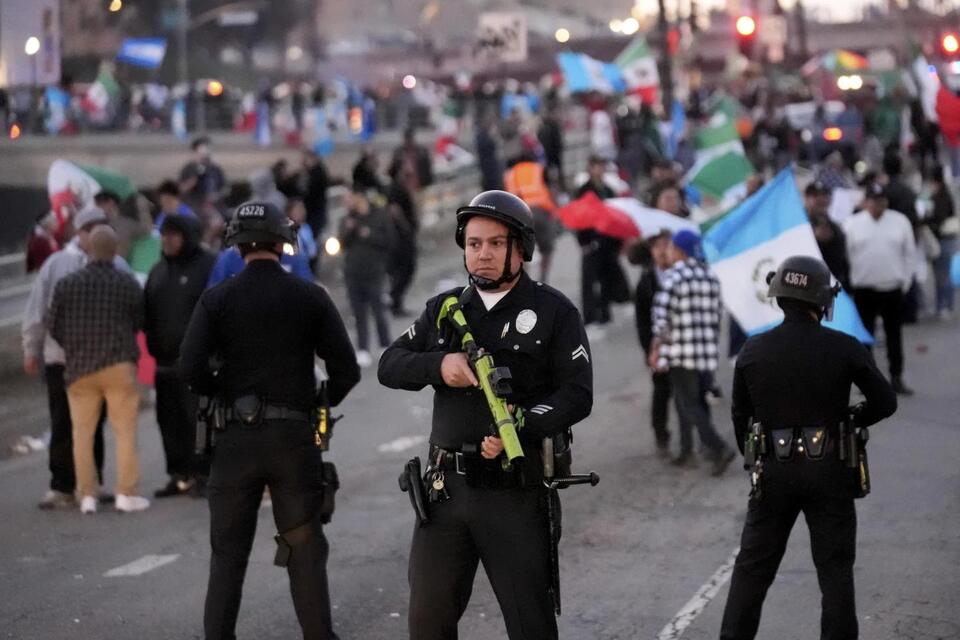 Protesters in cities across the US rally against Trump's policies ...