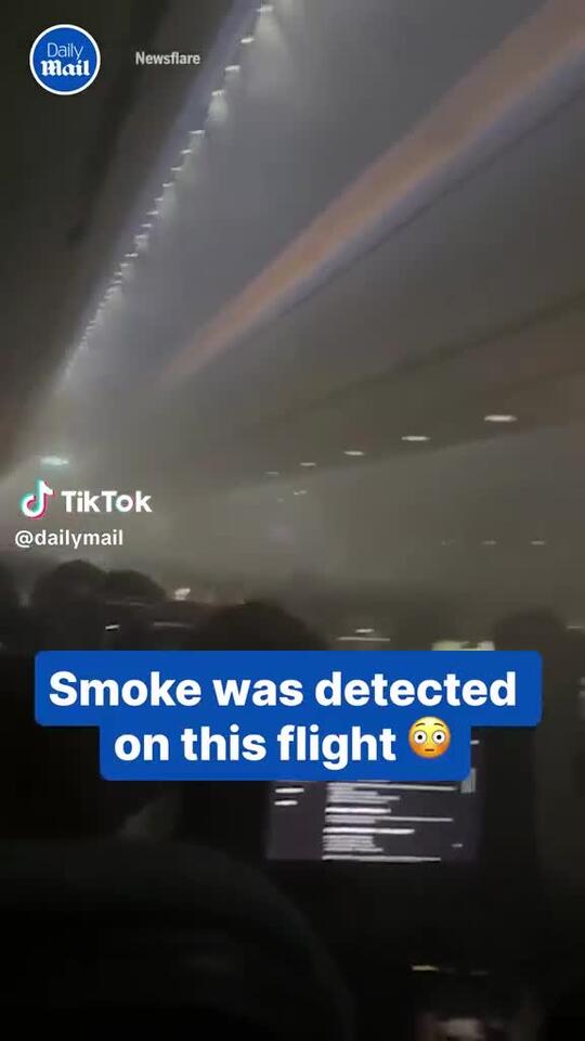 This is the terrifying moment a plane filled with smoke as it departed ...