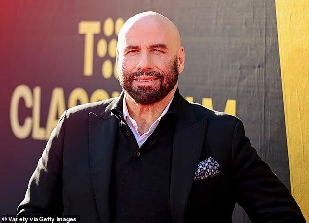 John Travolta explains THAT viral beret look at Cannes after being ...