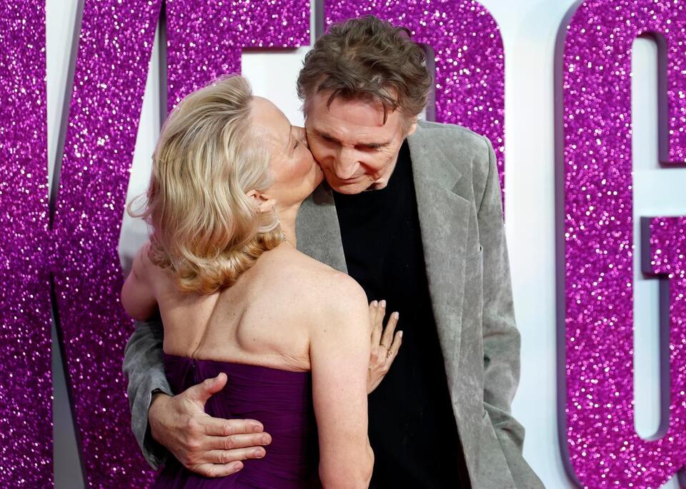 Pamela Anderson and Liam Neeson share red carpet kiss after his stunning confession about her ...