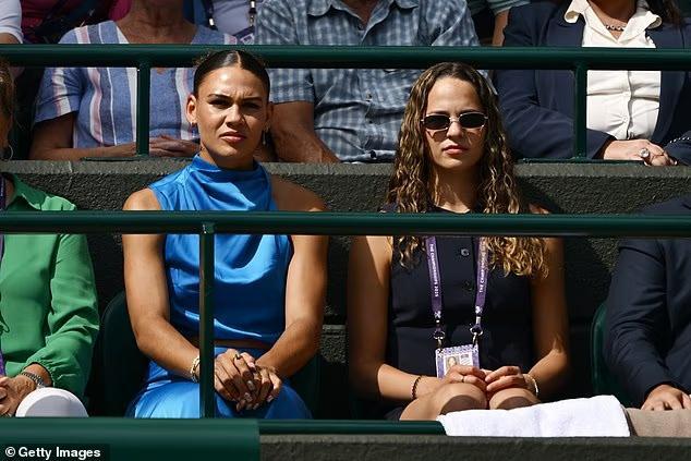 Loved-up Trinity Rodman stuns in blue dress as she supports tennis star ...