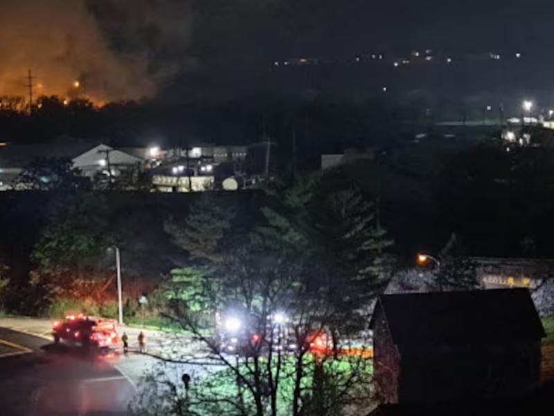 Nearly a dozen fire departments battle massive blaze next to railroad track