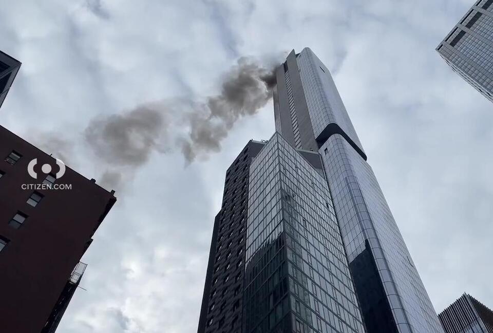 Fire erupts on roof of 72-story luxury residential building in Lower ...