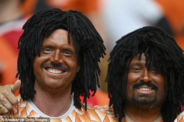 Netherlands fans are accused of doing 'blackface' in attempt to dress ...