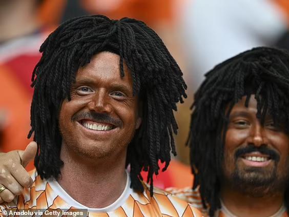 Netherlands fans are accused of doing 'blackface' in attempt to dress ...