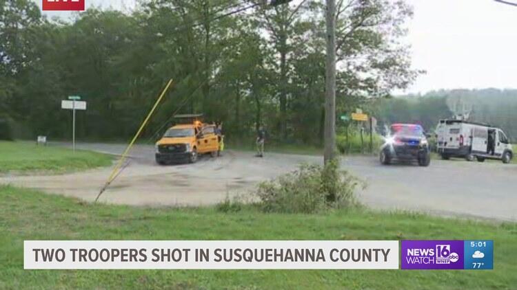 Road block still in place after shooting injures two state troopers ...