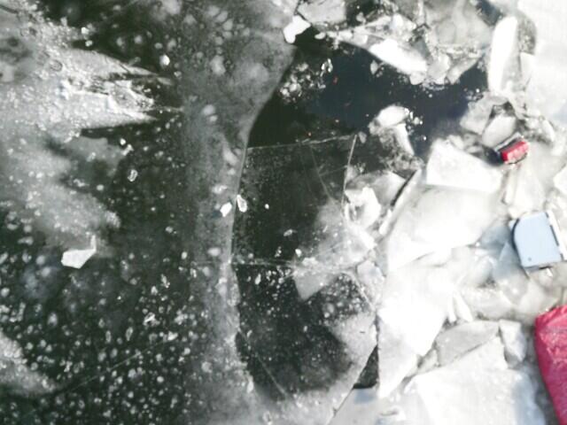 Snowmobile goes through ice in Suamico, 2 onboard