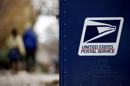 US Postal Service chief urges employees not to get distracted after ...