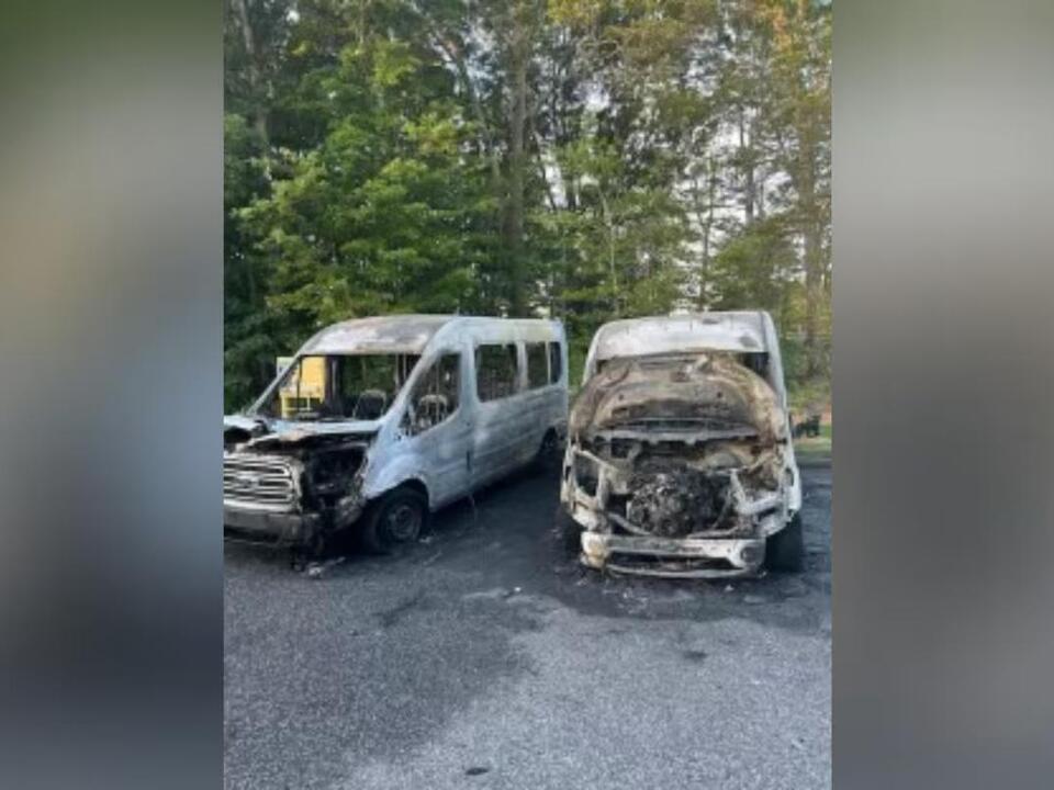 18-year-old turns himself in after setting church vans on fire