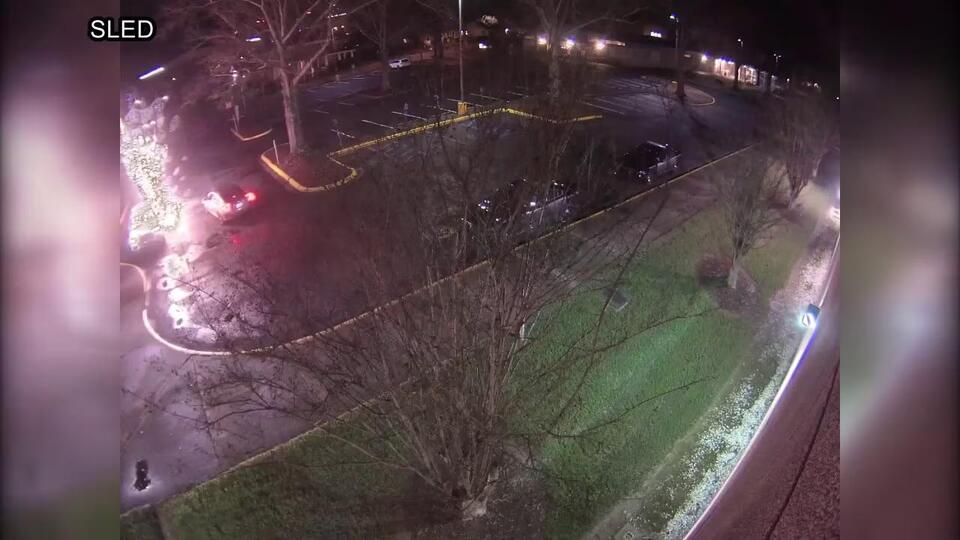 Video shows police officer ambushed in patrol car in explosion of ...