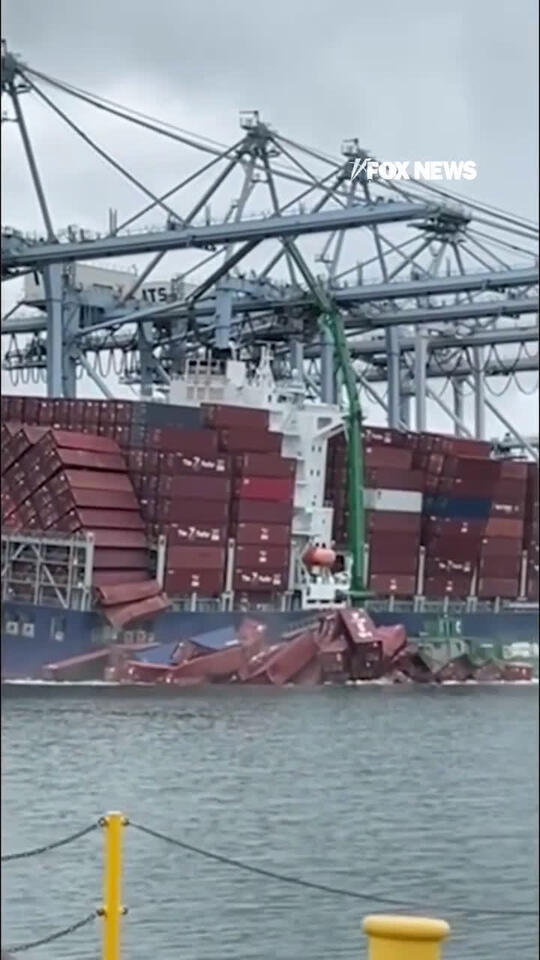 Shipping containers collapse with a thunderous boom at a California ...
