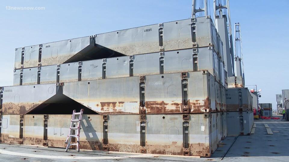 Military members in Newport News load ship with equipment to help build ...