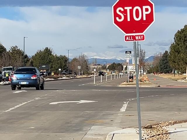 Why is the stop sign at 48th & Picadilly so far back from the intersection?
