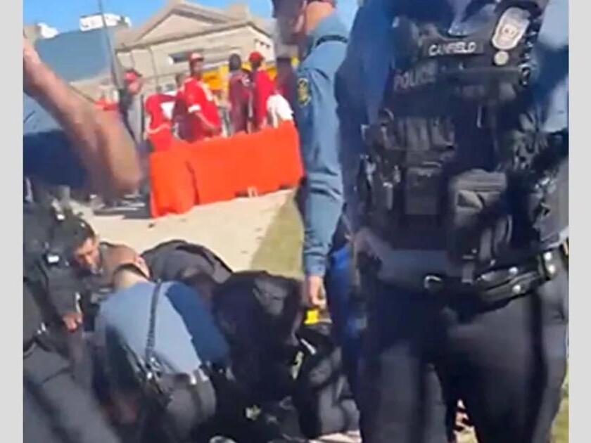Video shows fans tackle person after shot fired at Chiefs Super Bowl parade