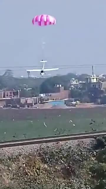 Indian Air Force training plane sinks into swamp as pilots escape ...