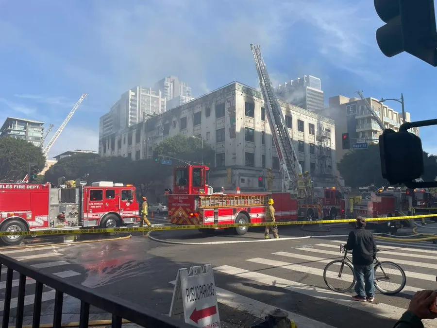 Fire crews knock down blaze at historic Morrison Hotel building in DTLA ...