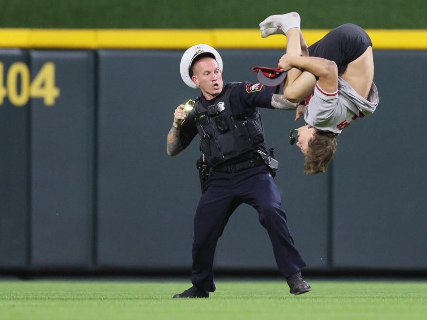 Behold This Backflipping, Taser-Fighting, Ballpark Crasher