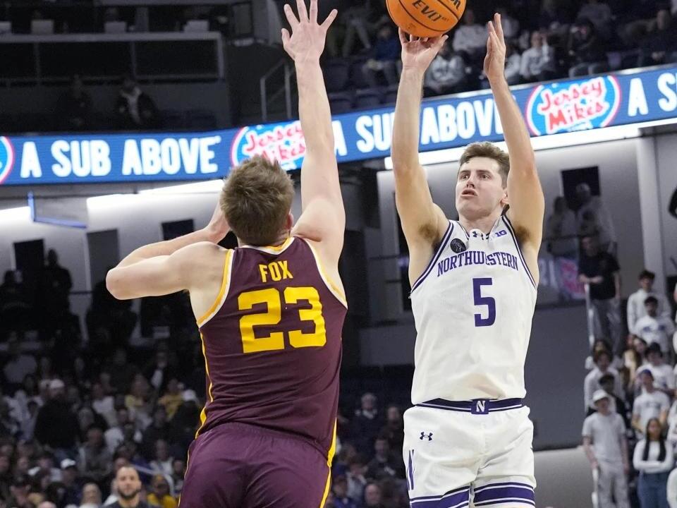 Barnhizer, Buie spark Northwestern to 90-66 romp over Minnesota