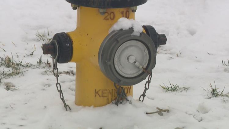 Frozen and snow-covered hydrants pose a challenge for fire crews ...