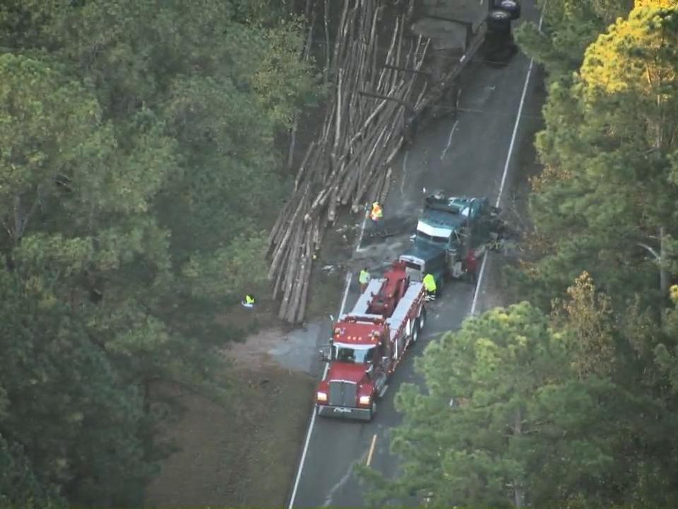 Driver unhurt when log truck overturns in Durham County - NewsBreak