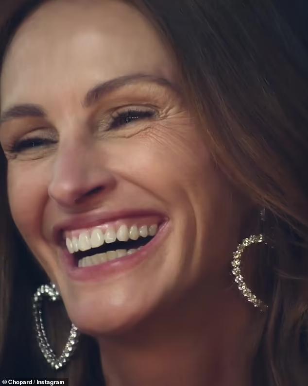 Julia Roberts, 56, flashes her Pretty Woman smile as she poses for ...