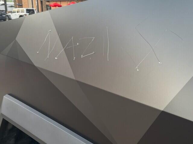Henderson man arrested after carving 'Nazi' into side of Tesla ...