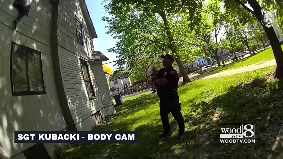 ‘Throw me your kid!’ Officer catches baby during escape from Michigan ...