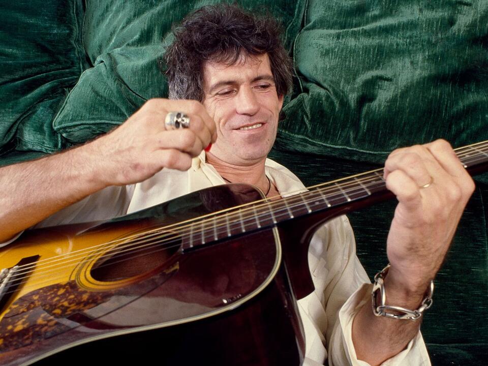 Keith Richards is an electric guitar icon, but he prefers playing ...