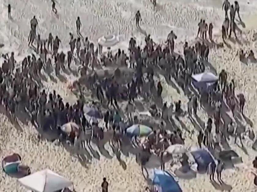 16-year-old girl rescued from 6-foot hole that partially collapsed on beach