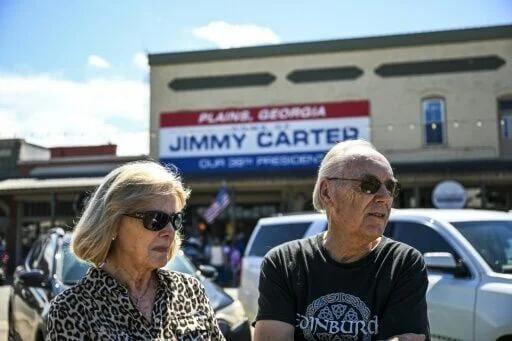 Rick Pape and his wife are seen in Plains on former president Jimmy ...