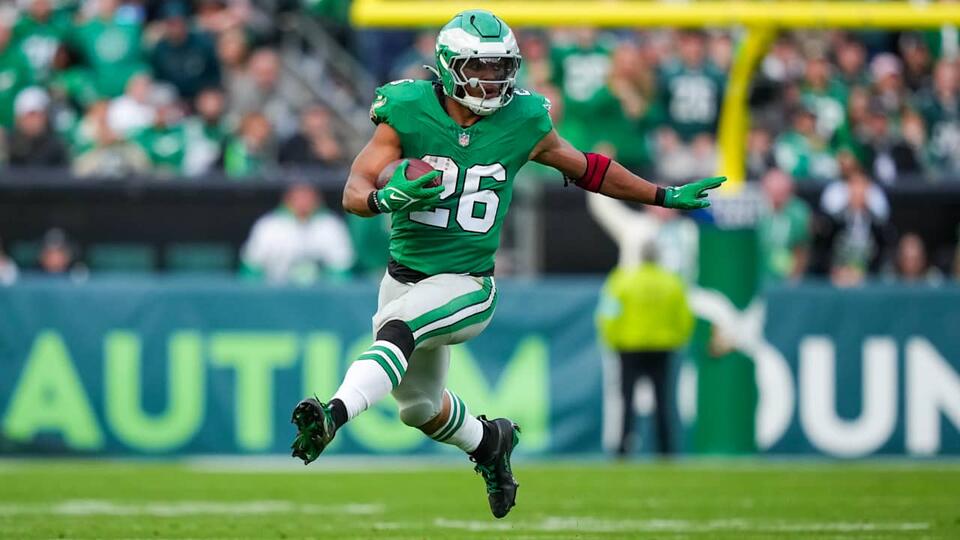 Eagles RB Saquon Barkley becomes ninth player to rush for 2,000 yards ...