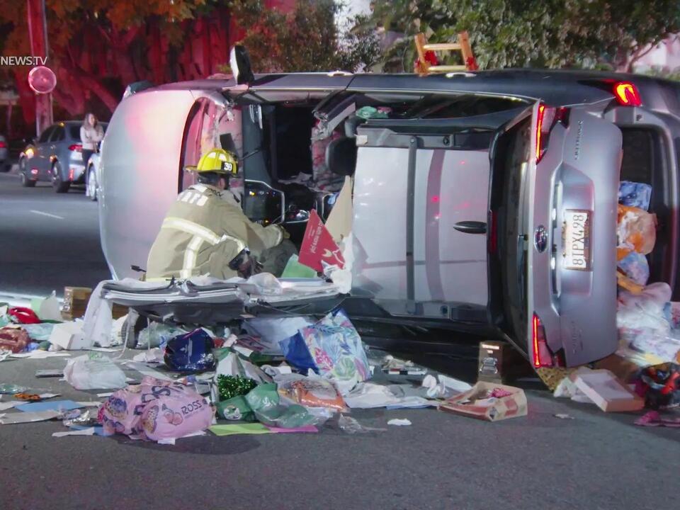 Driver Trapped After Rollover Crash Involving 2 Parked Vehicles in Van Nuys
