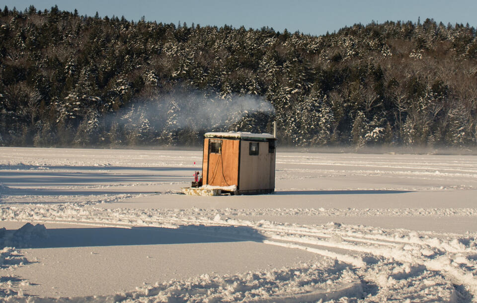 UTV driver crashes through lake ice while pulling fish house - NewsBreak