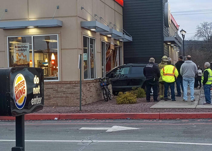 Car crashes into Burger King - NewsBreak