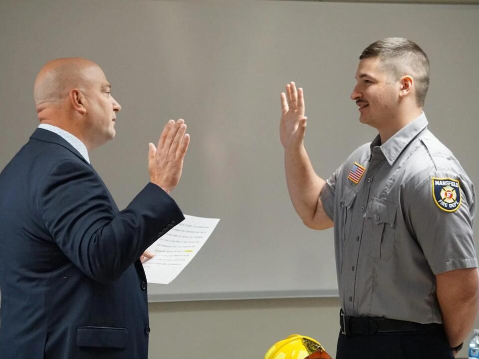 Like father, like son: Jake Bruce sworn into Mansfield Fire Dept.