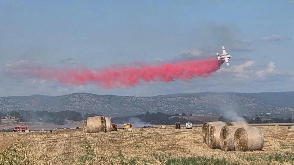 Fire crews stop forward spread of hay field fire near Honcut in Butte ...